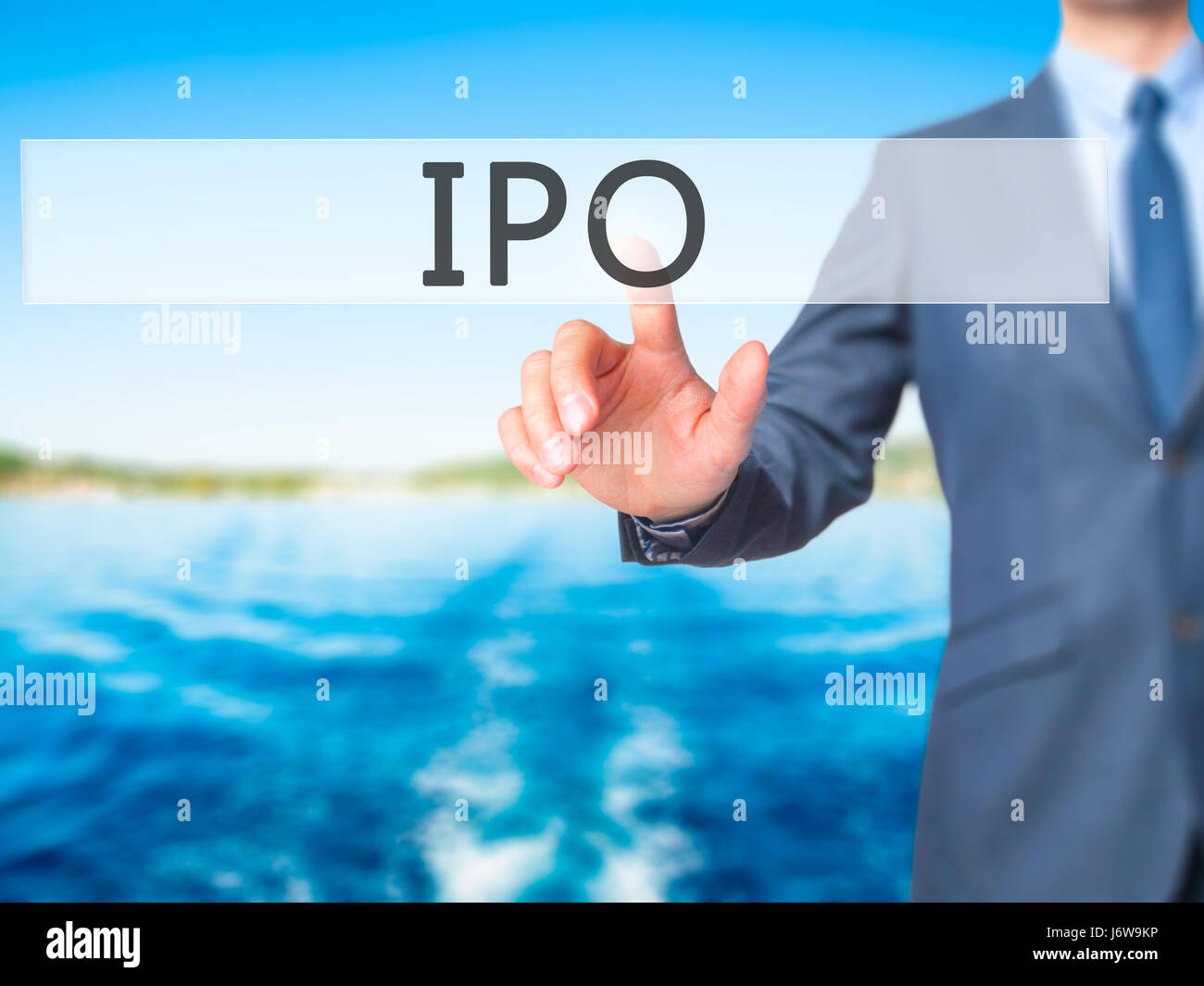 IPO - Businessman hand pressing button on touch screen interface ...