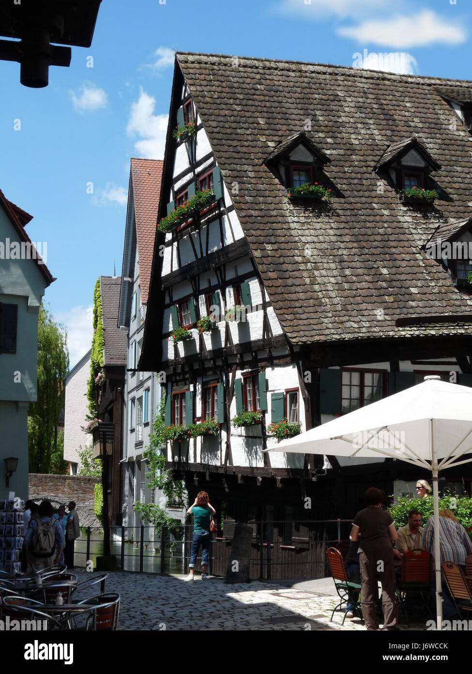 blue house building frame-work hotel river water blue house building ...