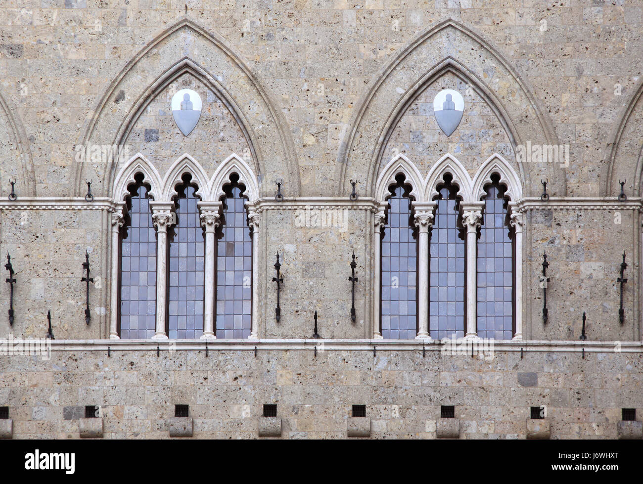 gothic double windows at a palace Stock Photo - Alamy