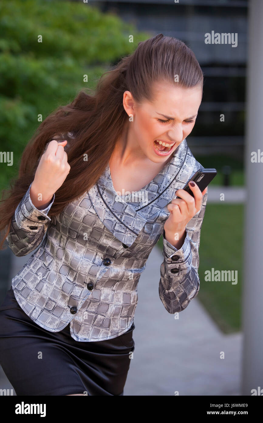 woman telephone phone face frustrated expression raving furious angry ...