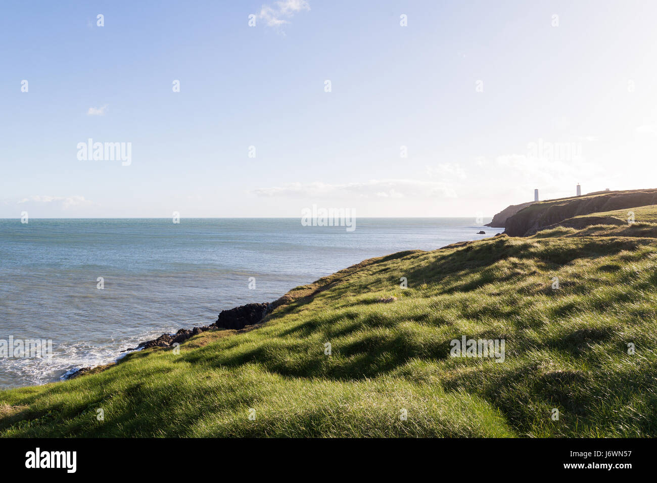 View of Irish Sea and Green Grassy Coastal Cliffs Stock Photo - Alamy