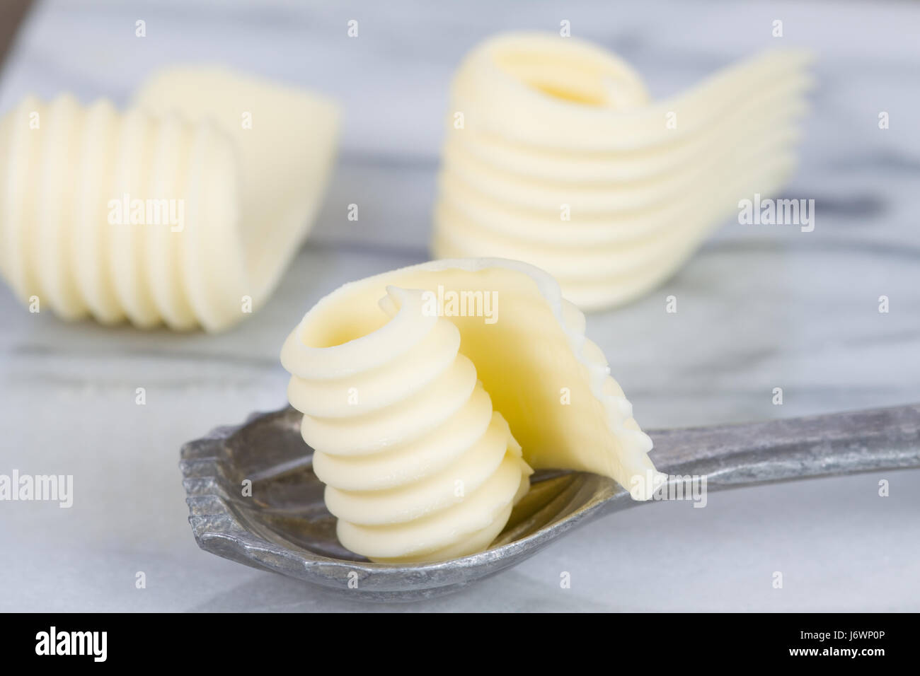 Curved spoon hi-res stock photography and images - Alamy
