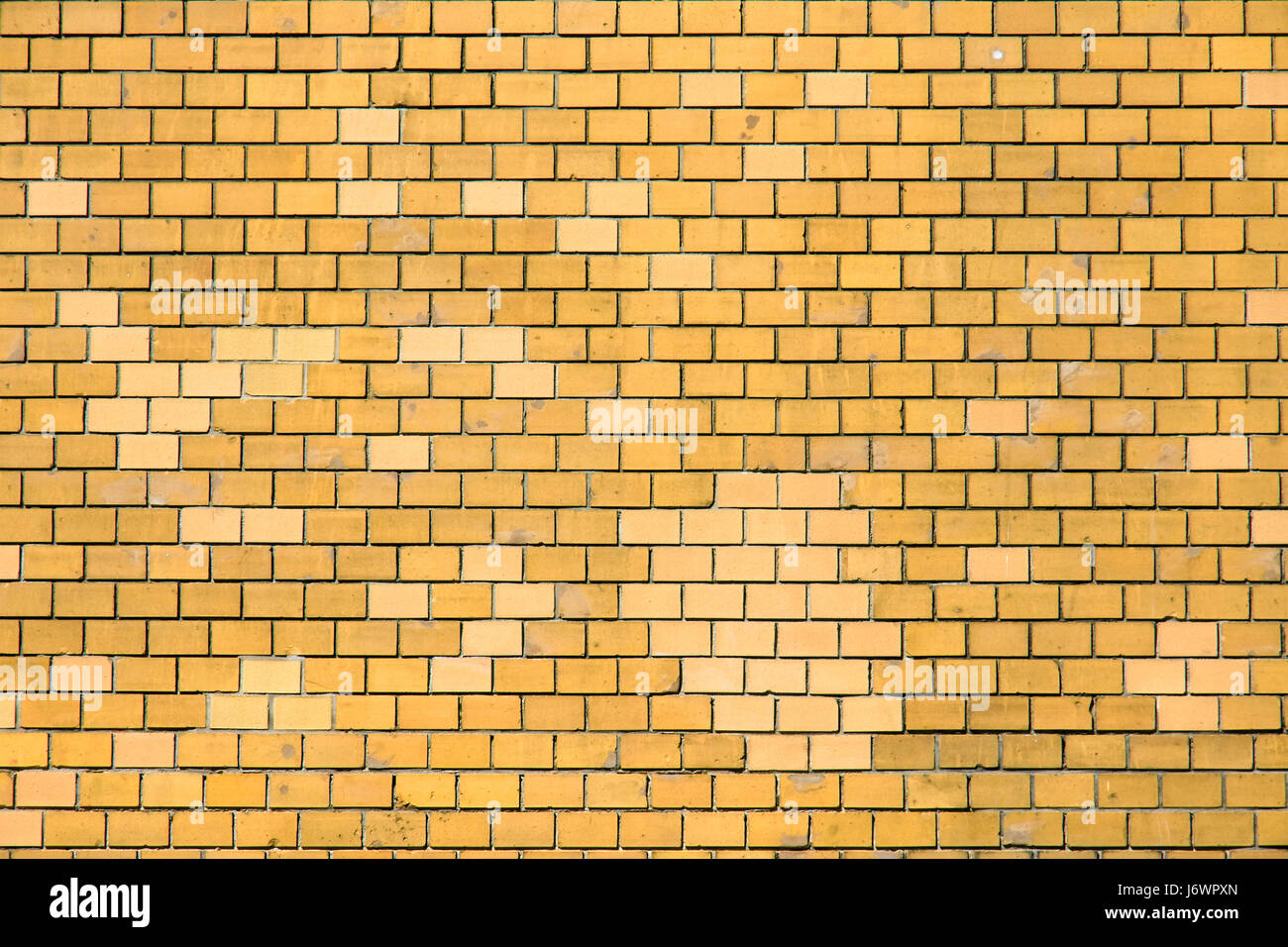 yellow brick wall Stock Photo - Alamy
