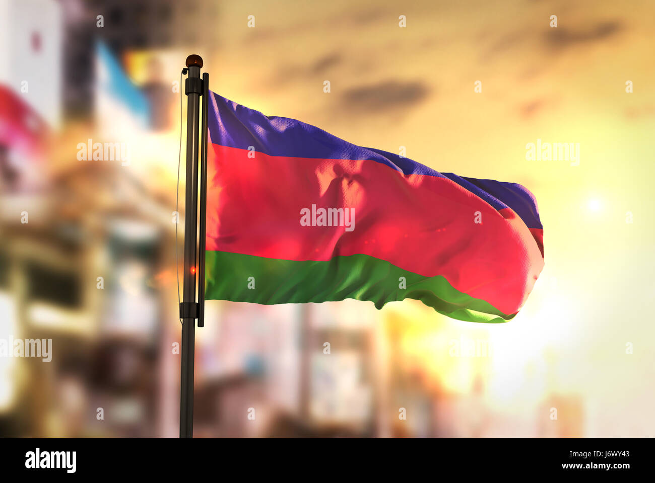 Kuban People's Republic Flag Against City Blurred Background At Sunrise ...