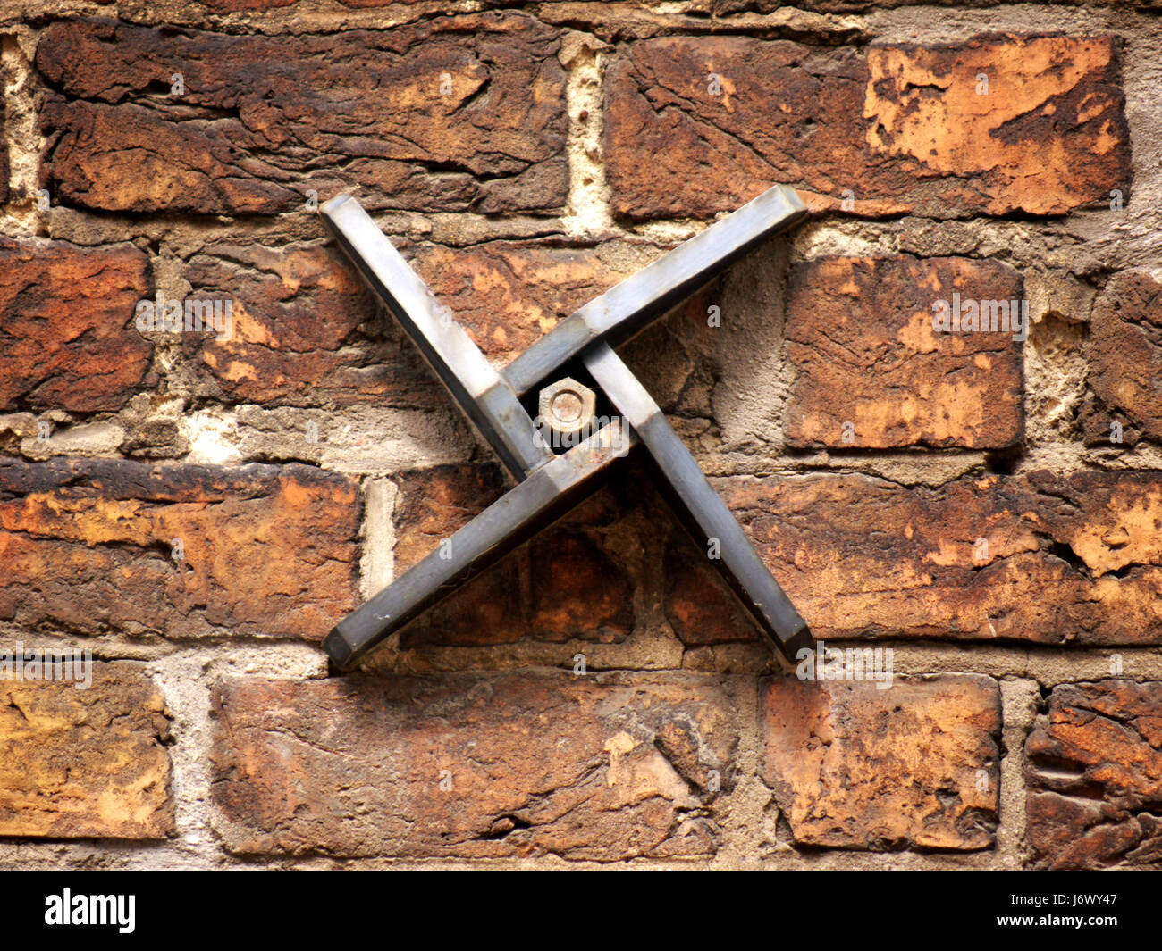 brick wall with cross Stock Photo - Alamy