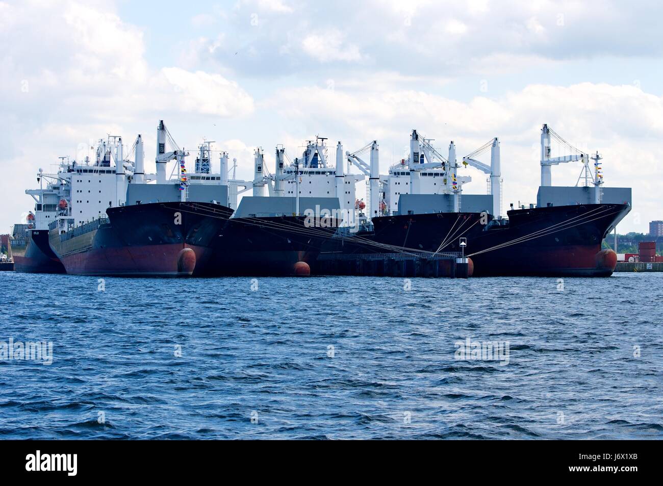 blue city town bridge new harbor dock freighter boat fright week ship ...