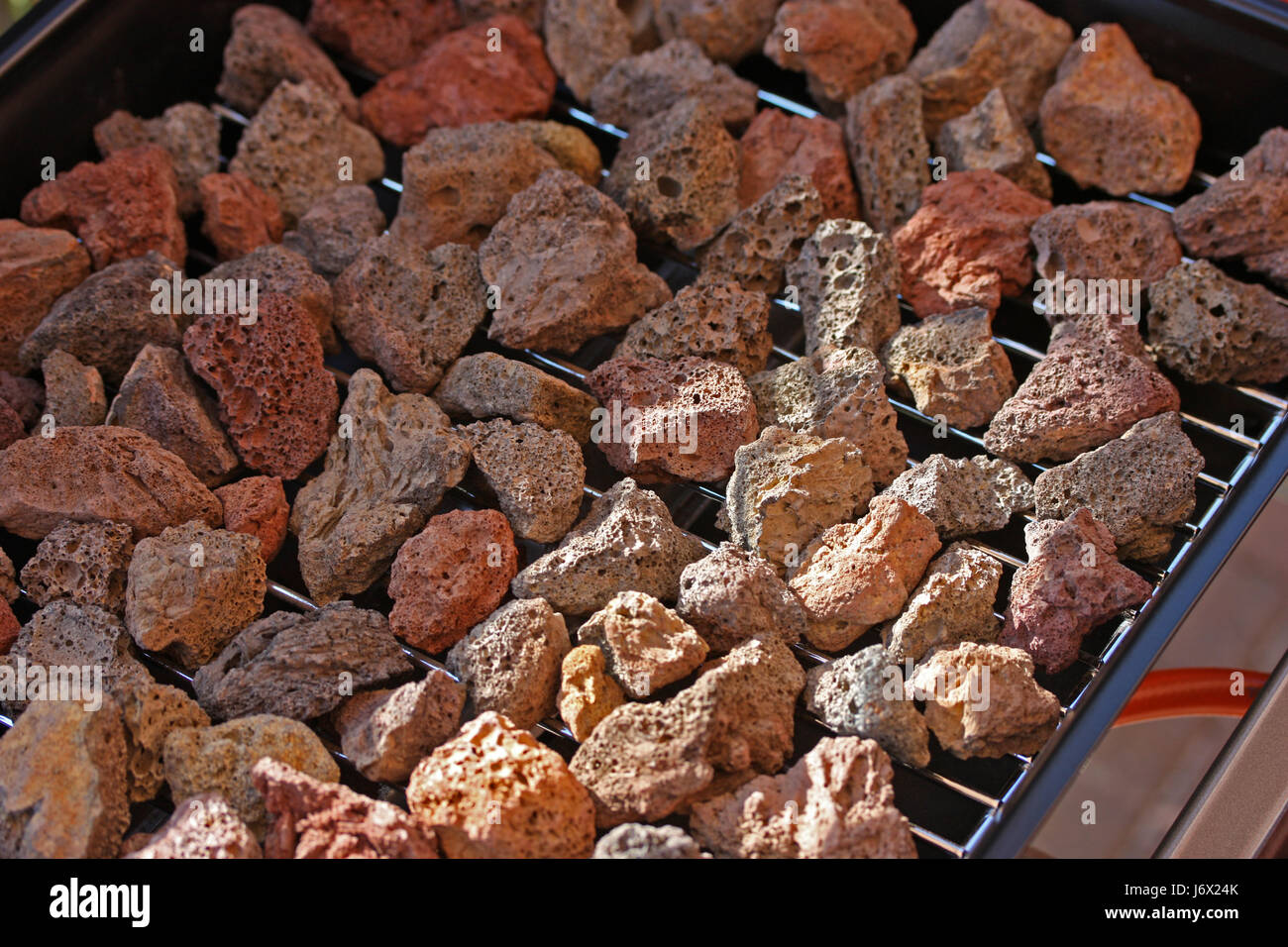 gas grill with lava stones Stock Photo - Alamy