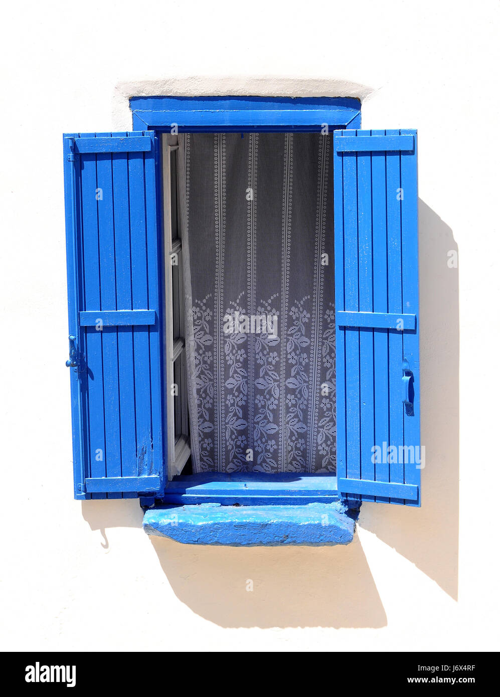 Wooden window in blue Cut Out Stock Images & Pictures - Alamy