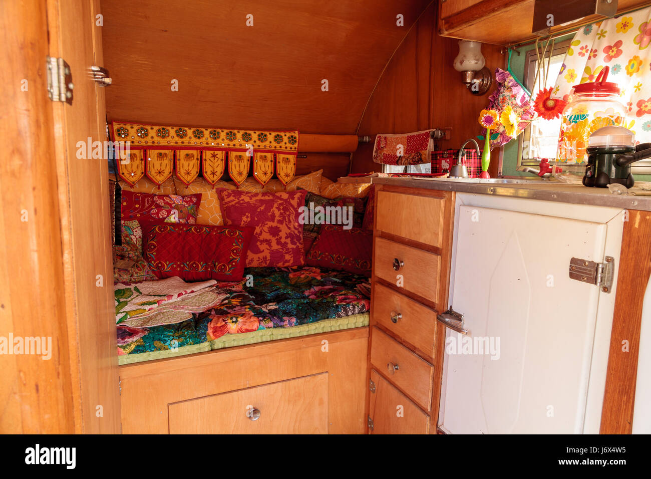 Small retro caravan camper used as a tiny house on road trips to the ...