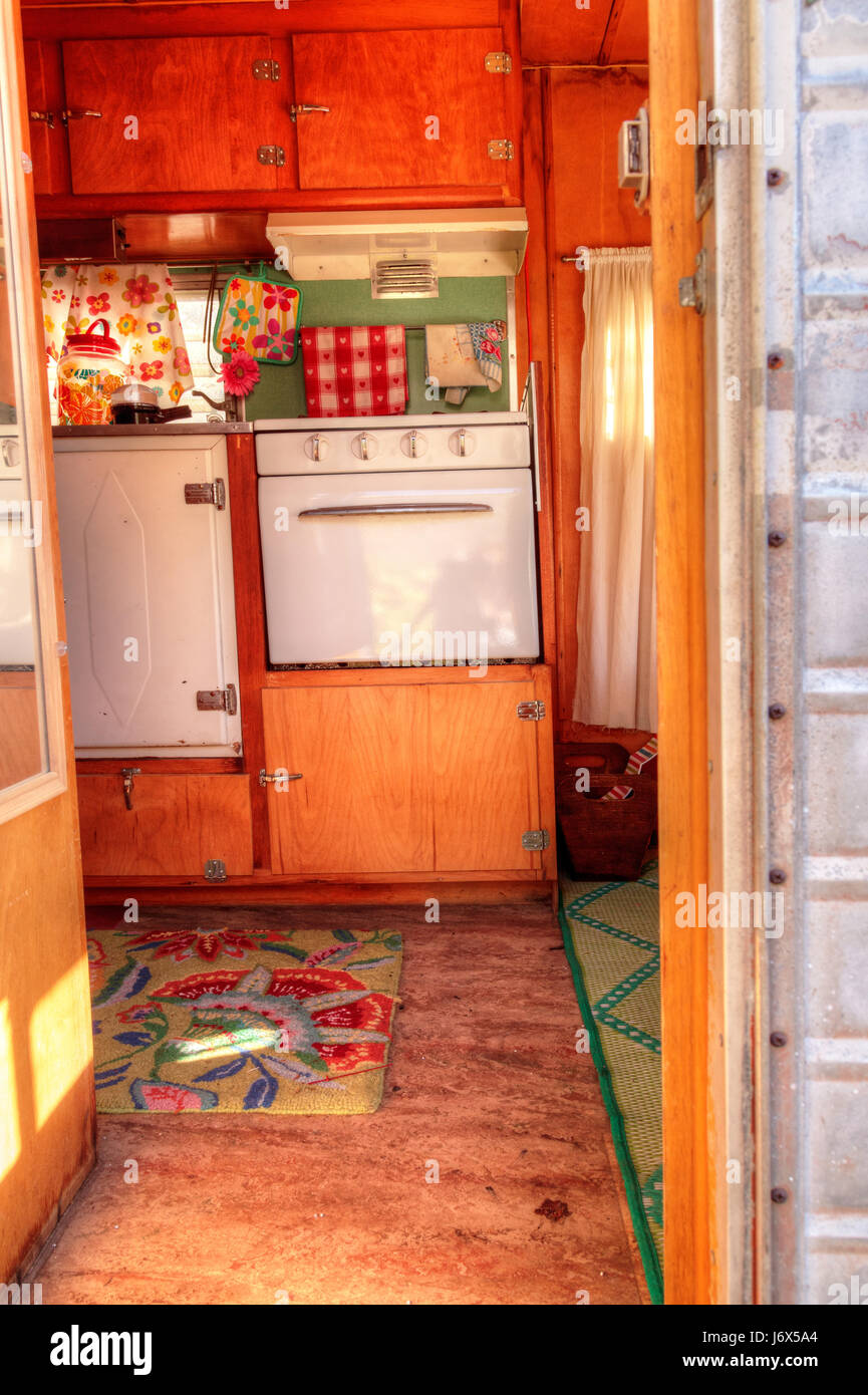 Small retro caravan camper used as a tiny house on road trips to the ...