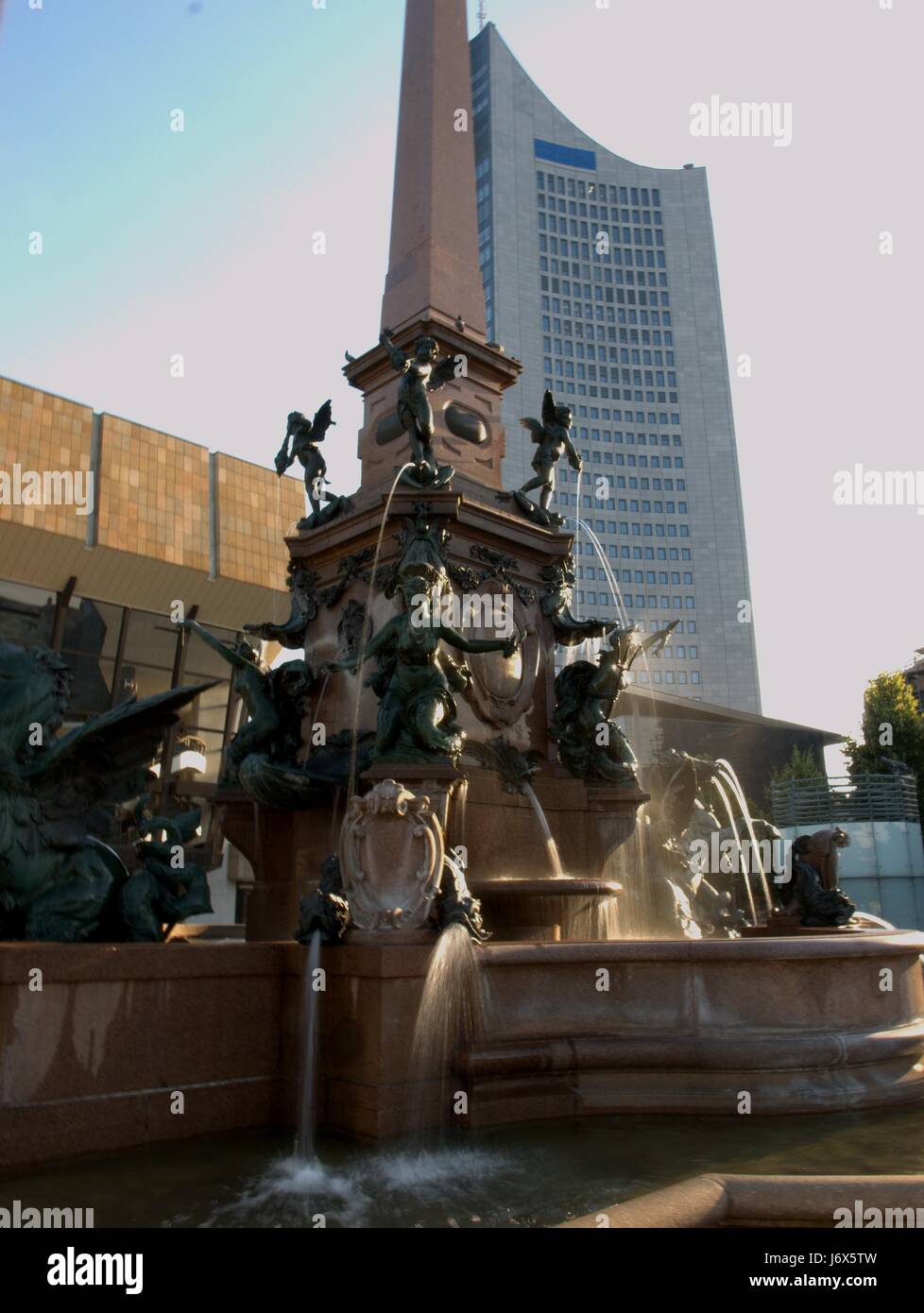 mendebrunnen and mdr tower in leipzig Stock Photo - Alamy