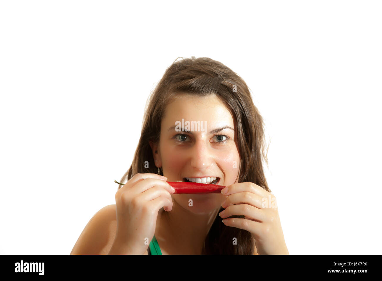 chili eating woman Stock Photo - Alamy