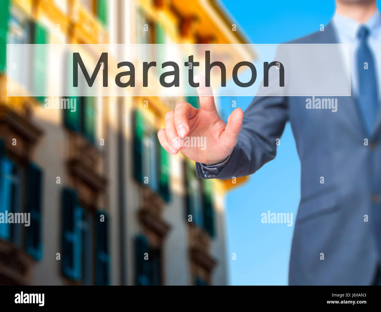 Marathon - Businessman hand pressing button on touch screen interface ...