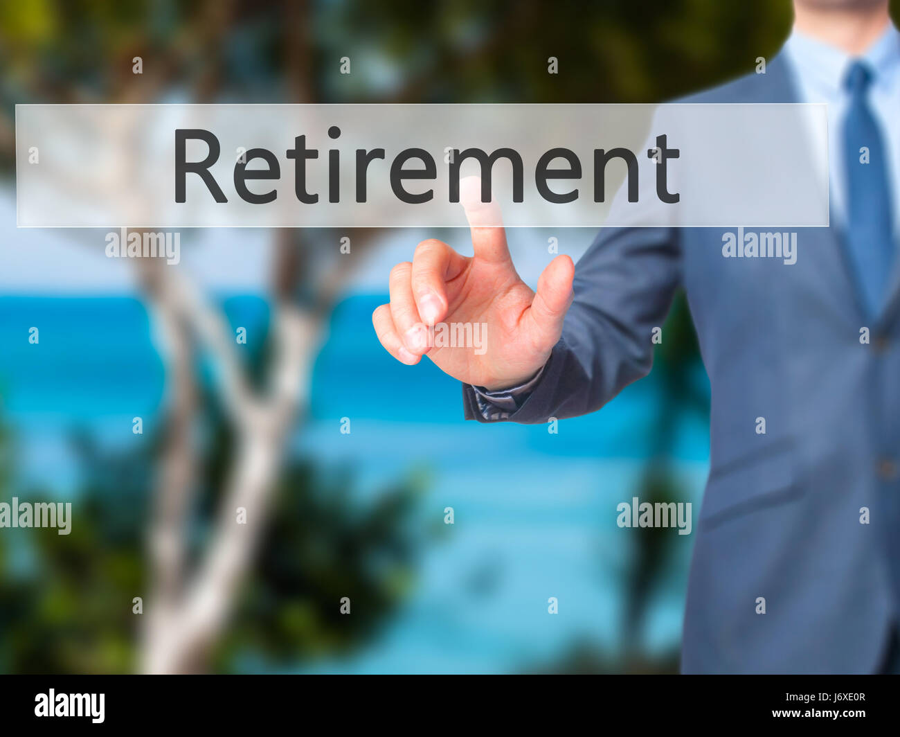 Retirement - Businessman hand pressing button on touch screen interface ...