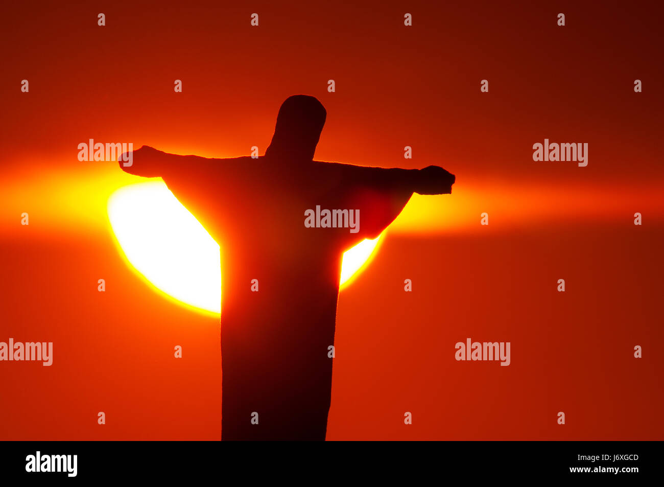 Statue of Christ The Redeemer made of sand at sunrise in Copacabana ...