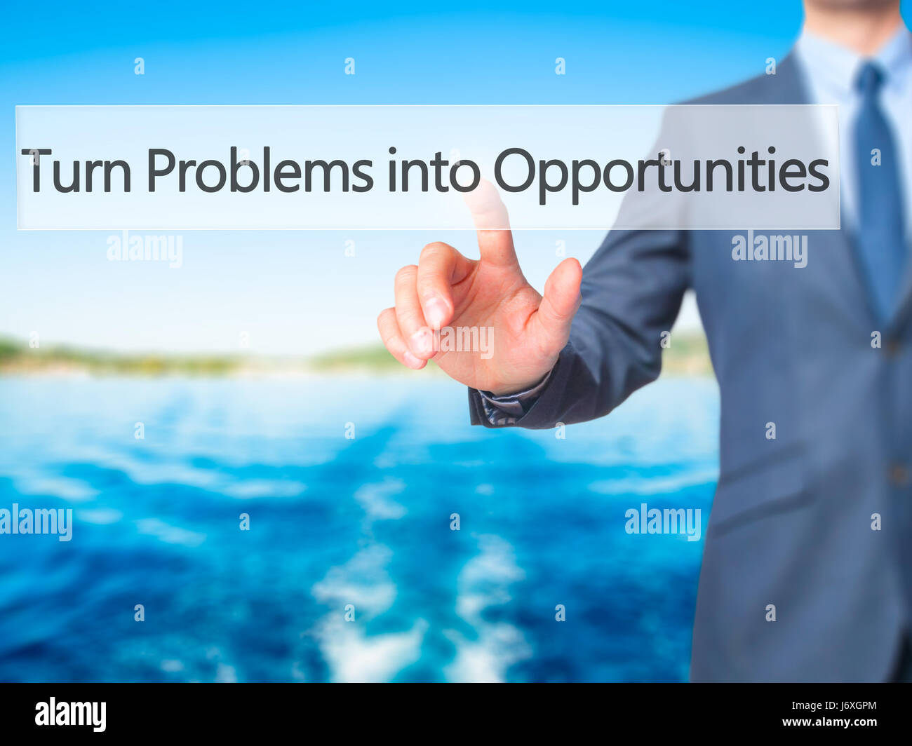Turn Problems into Opportunities - Businessman hand pressing button on ...