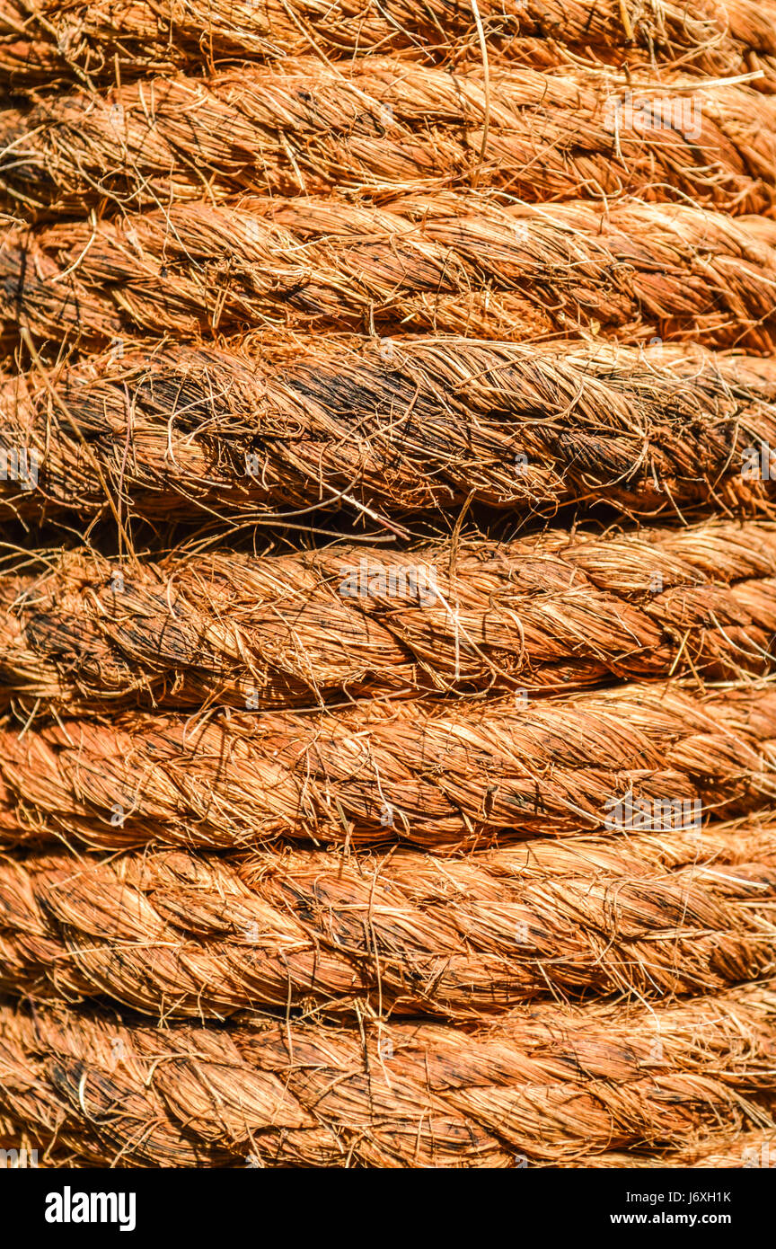 rope tied around a wood Stock Photo - Alamy