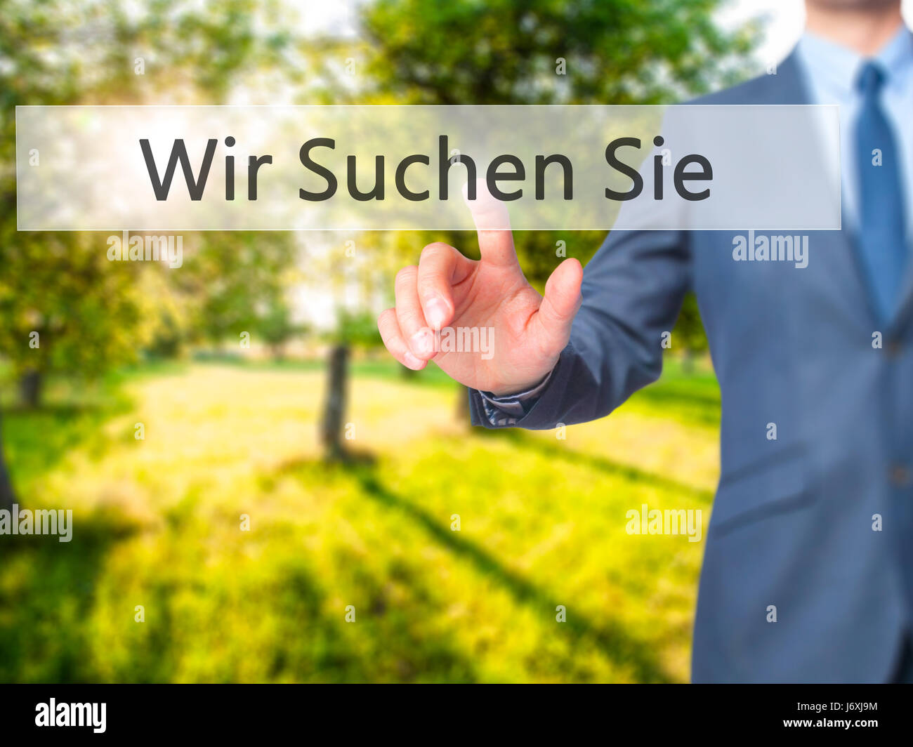 Wir Suchen Sie! (Looking For You in German) - Businessman hand touch ...