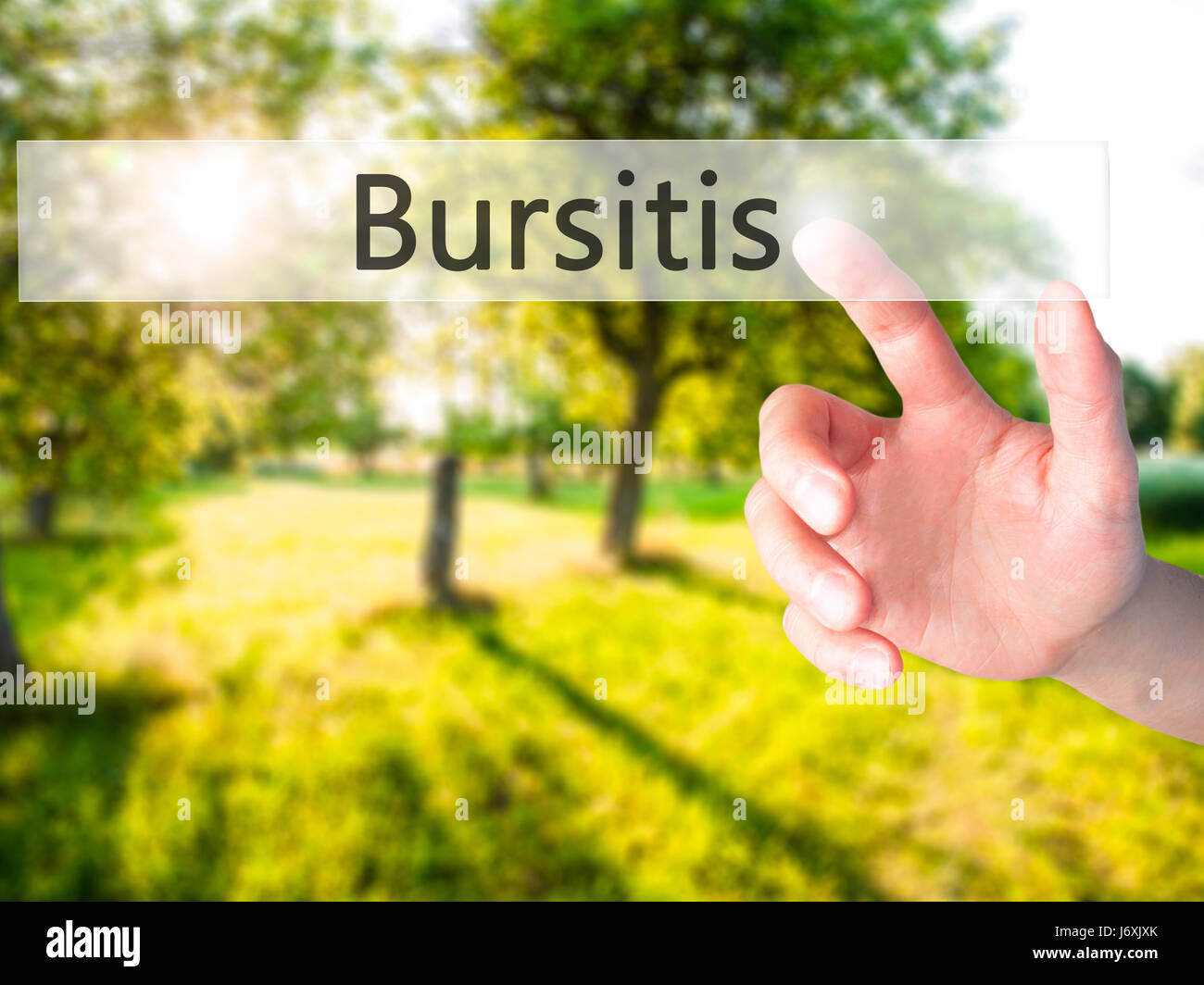 Bursitis - Hand pressing a button on blurred background concept ...