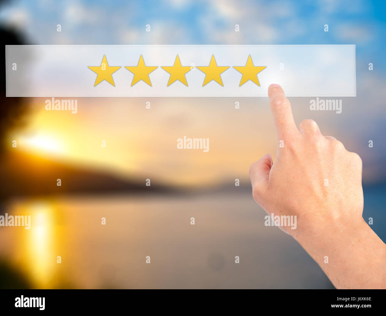 Five star rating - Hand pressing a button on blurred background concept ...