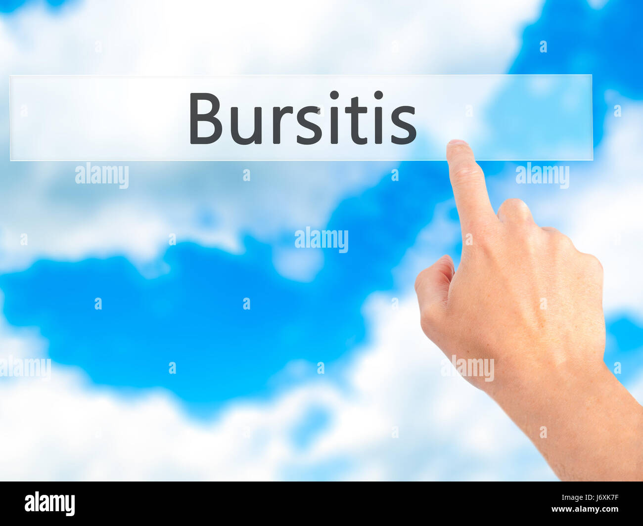 Bursitis - Hand pressing a button on blurred background concept ...