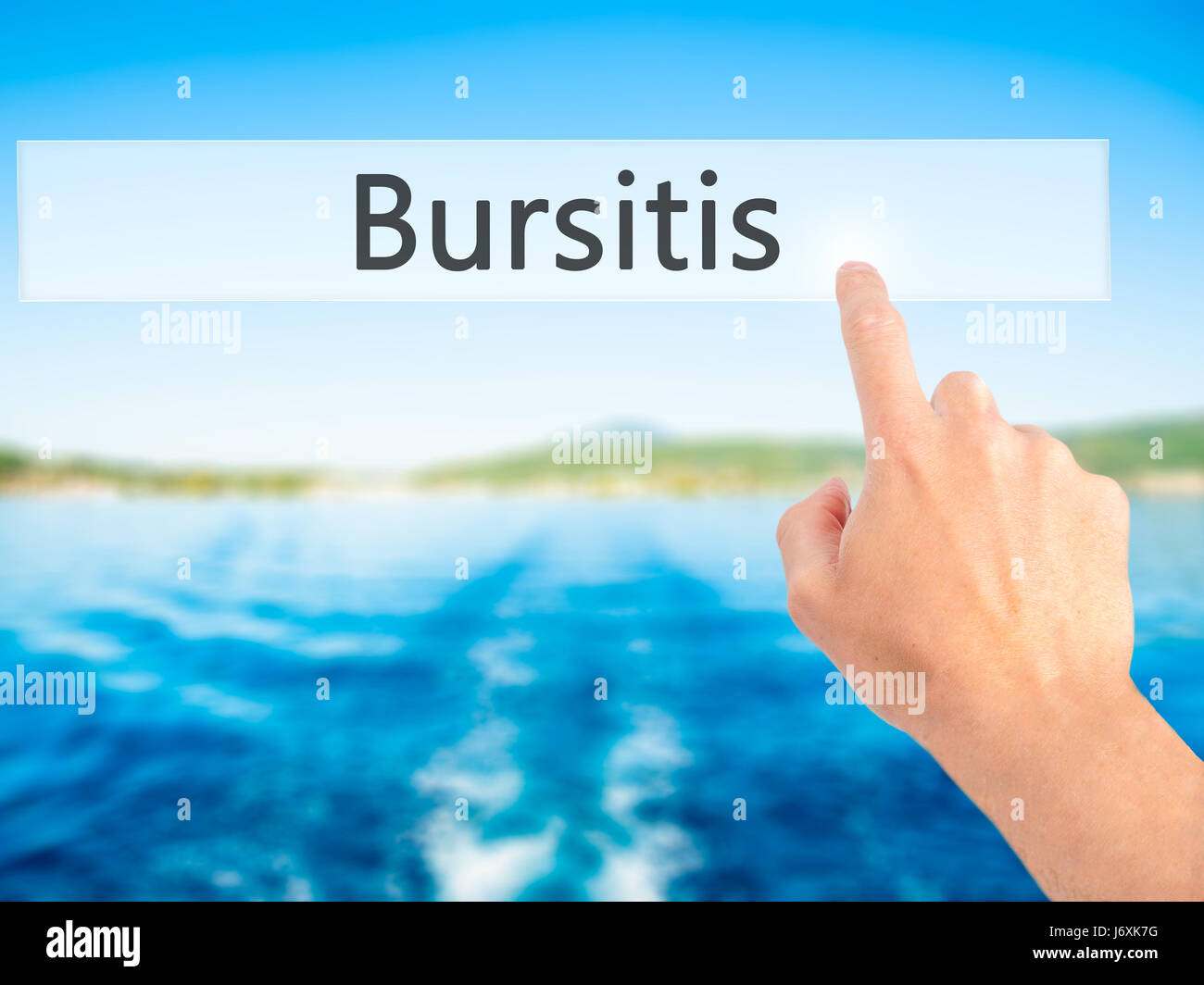 Bursitis - Hand pressing a button on blurred background concept ...
