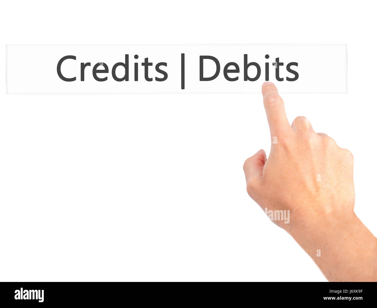 Credits Debits - Hand pressing a button on blurred background concept ...