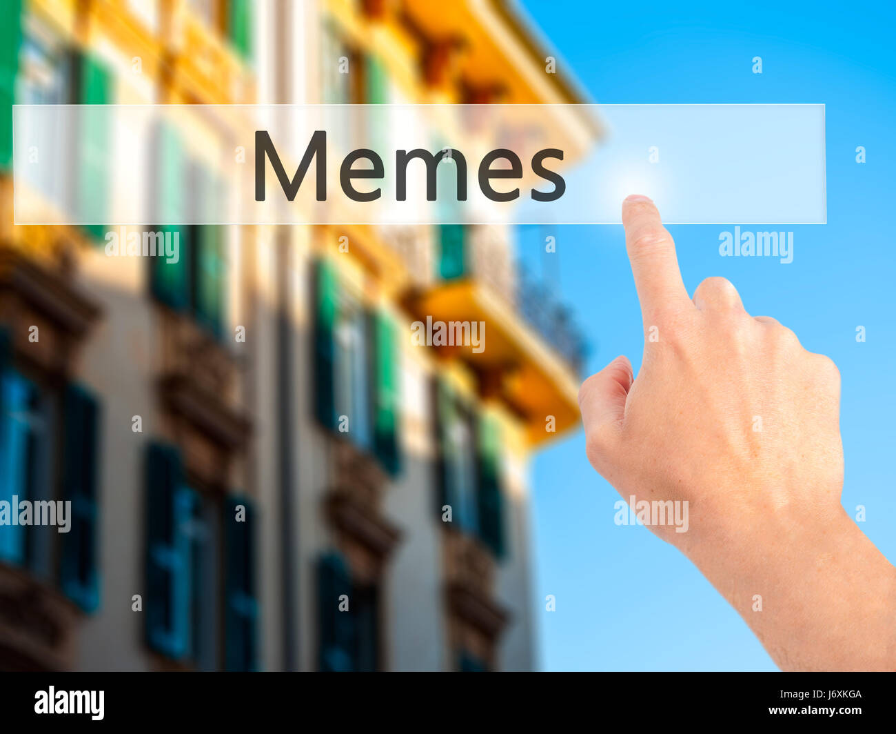 Memes - Hand pressing a button on blurred background concept . Business ...