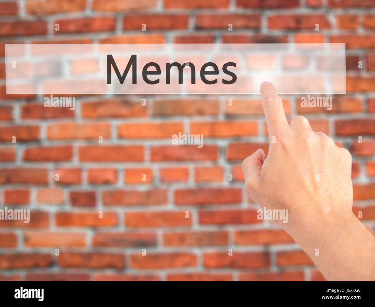 Memes - Hand pressing a button on blurred background concept . Business ...