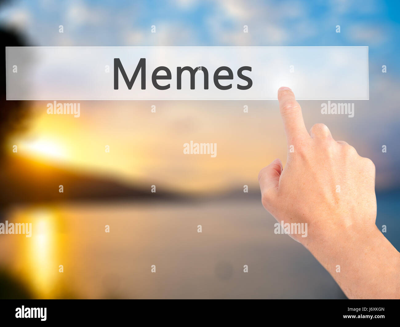 Memes - Hand pressing a button on blurred background concept . Business ...