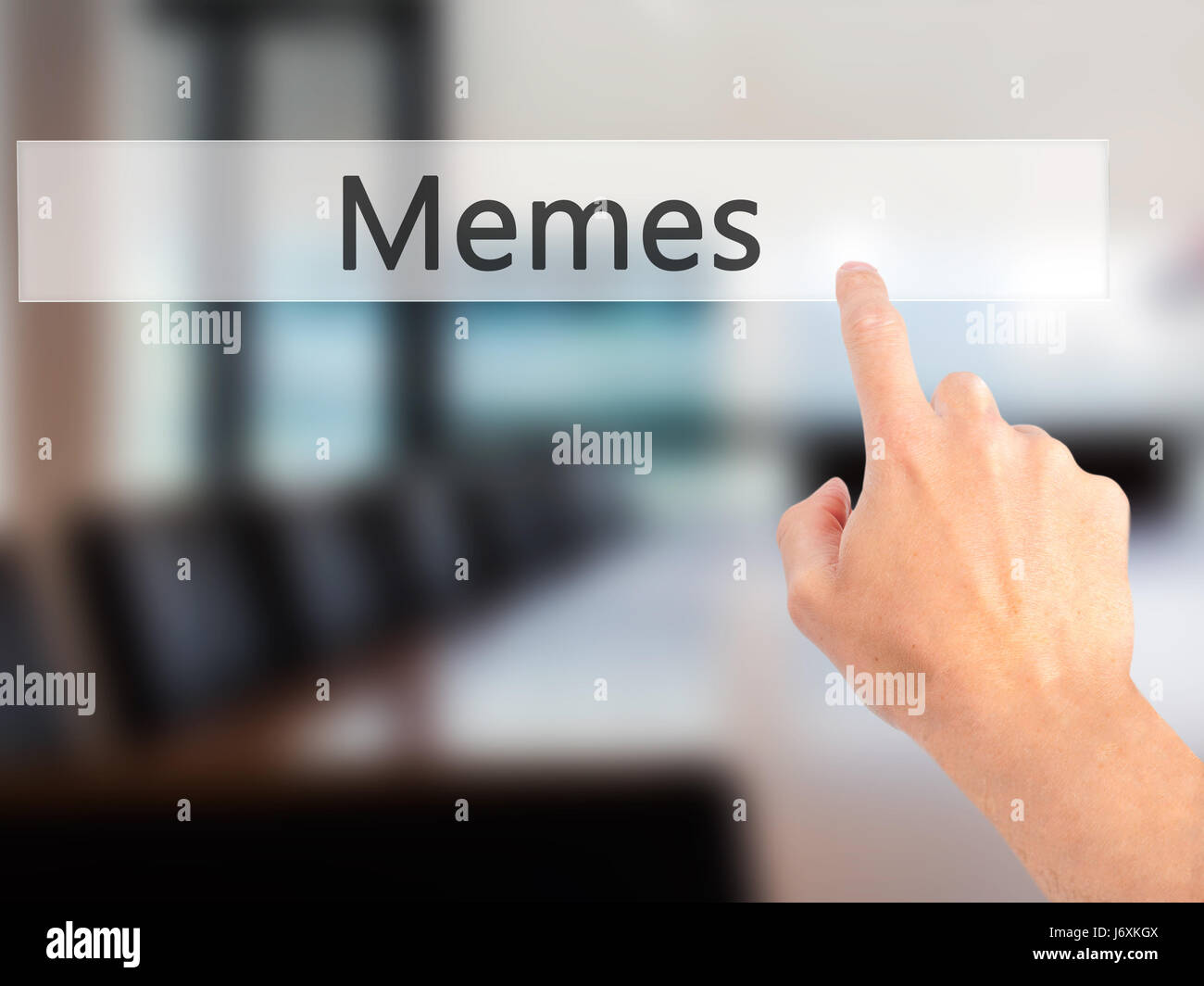 Memes - Hand pressing a button on blurred background concept . Business ...