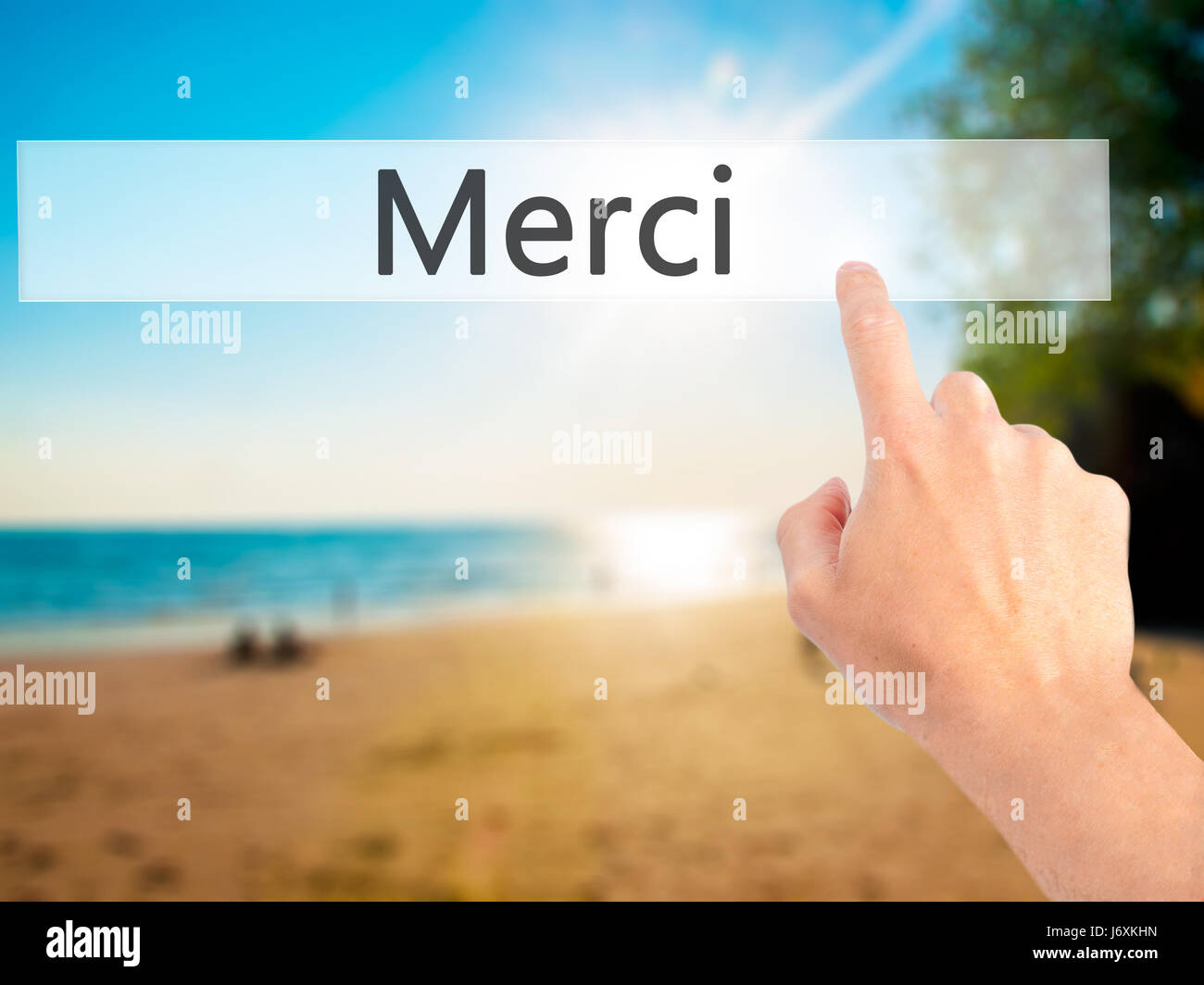 Merci - Hand pressing a button on blurred background concept . Business ...