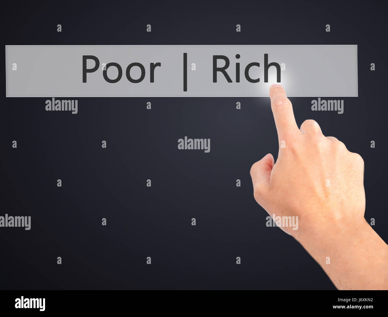 Poor Rich - Hand pressing a button on blurred background concept ...