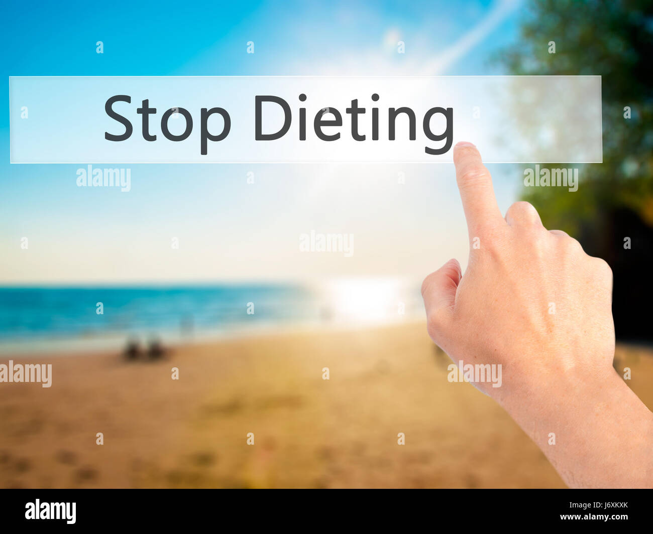 Stop Dieting - Hand pressing a button on blurred background concept ...