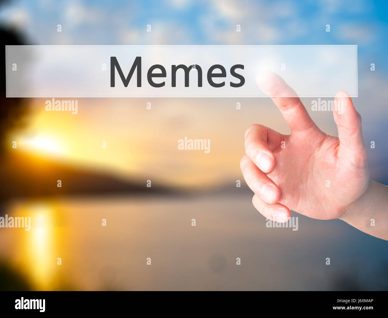 Memes - Hand pressing a button on blurred background concept . Business ...