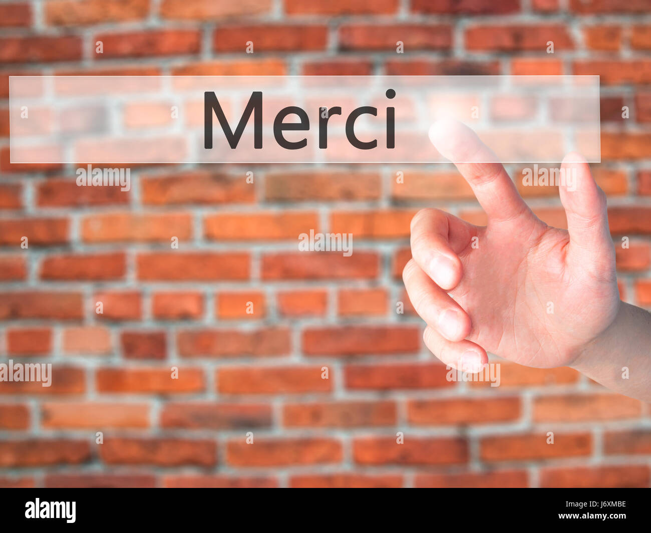Merci - Hand pressing a button on blurred background concept . Business ...