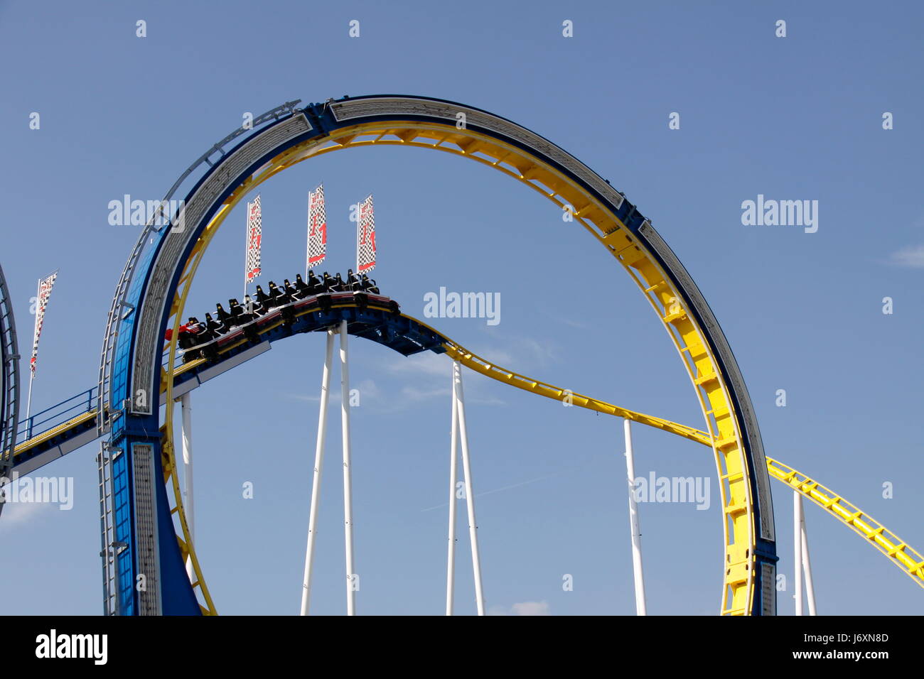 fair folk festival loop ferris wheel switchback carousel theme park railway Stock Photo - Alamy