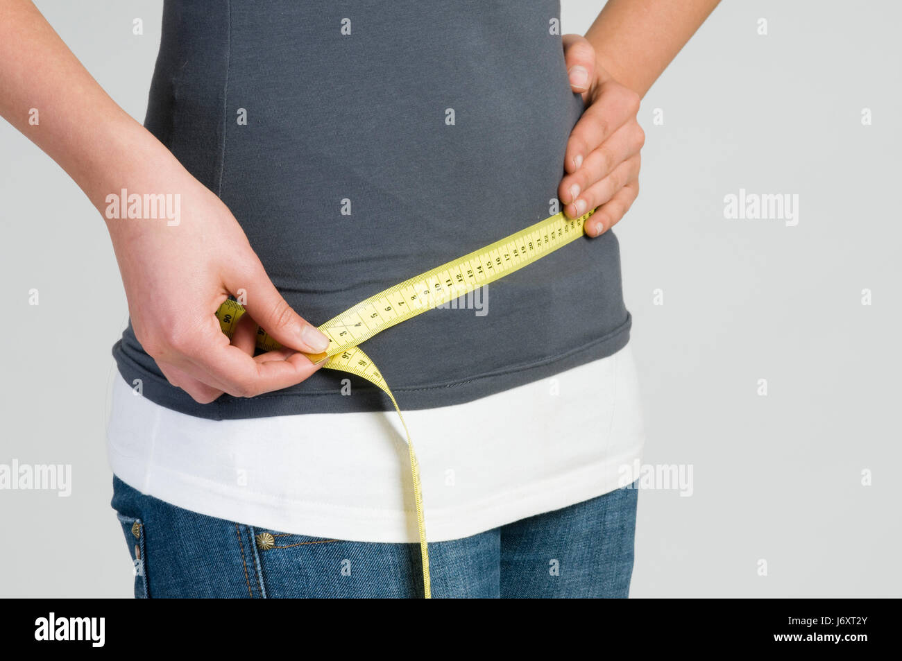 woman measured sured measure belly tummy tape measure woman beautiful ...