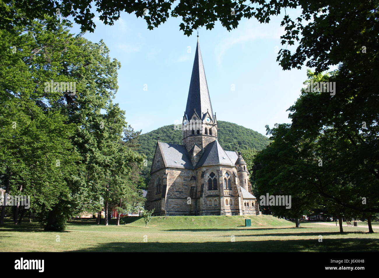 church tree trees mountains window porthole dormer window pane church ...