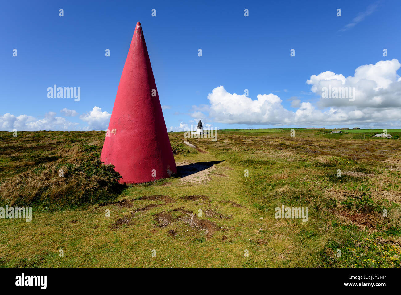 Cone shaped daymarks and navigation markers on cliffs at Gwennap Head ...