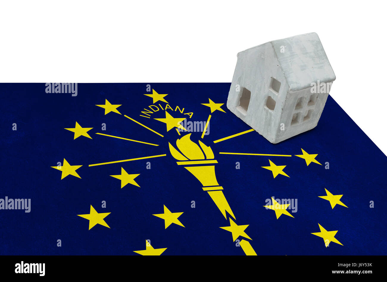 Small house on a flag - Living or migrating to Indiana Stock Photo - Alamy