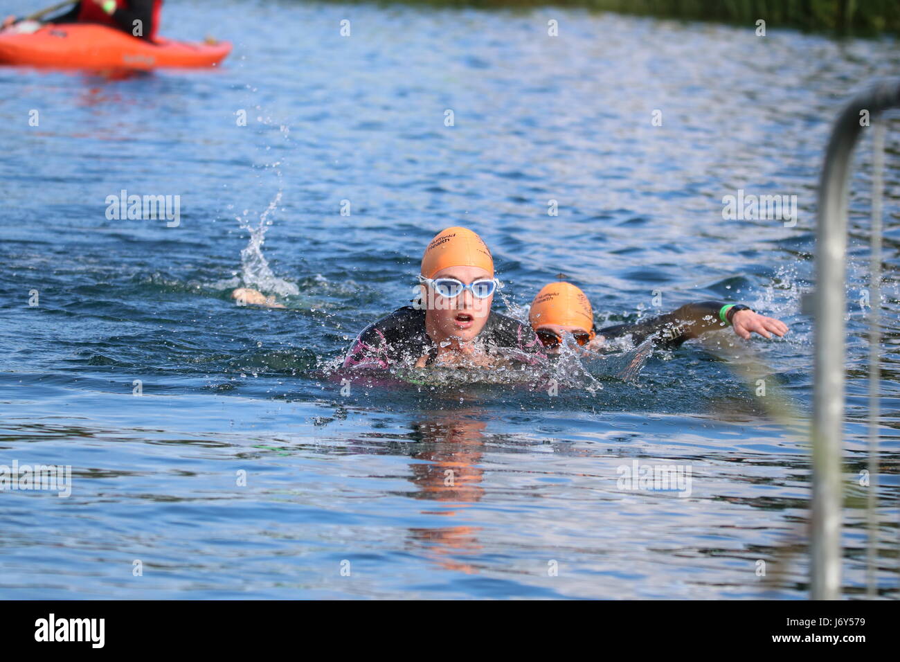 Swimmers leaving the water at the Eton Sprint Triathalon at Dorney Lake ...