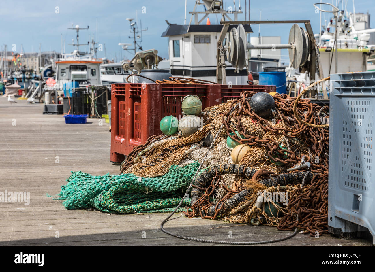Fishing materials on the harbor pontoon Stock Photo - Alamy