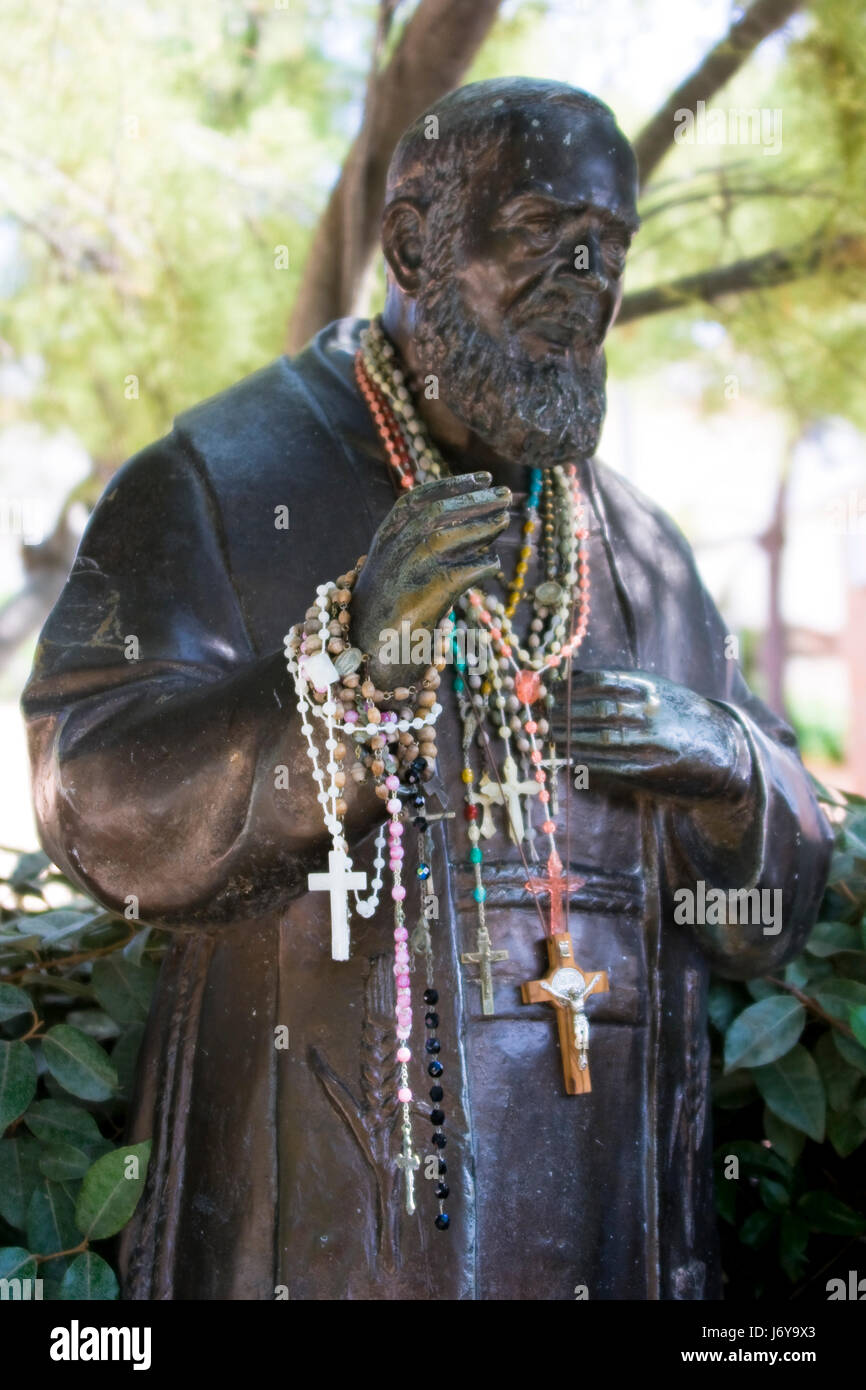 religion statue person crucifix rosary bronze italy humans human beings ...