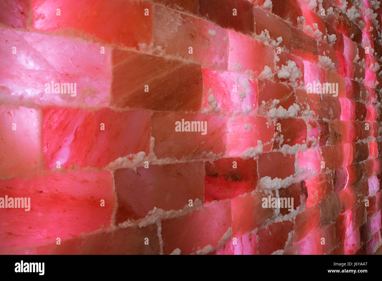 Pink salt room in the spa Stock Photo - Alamy