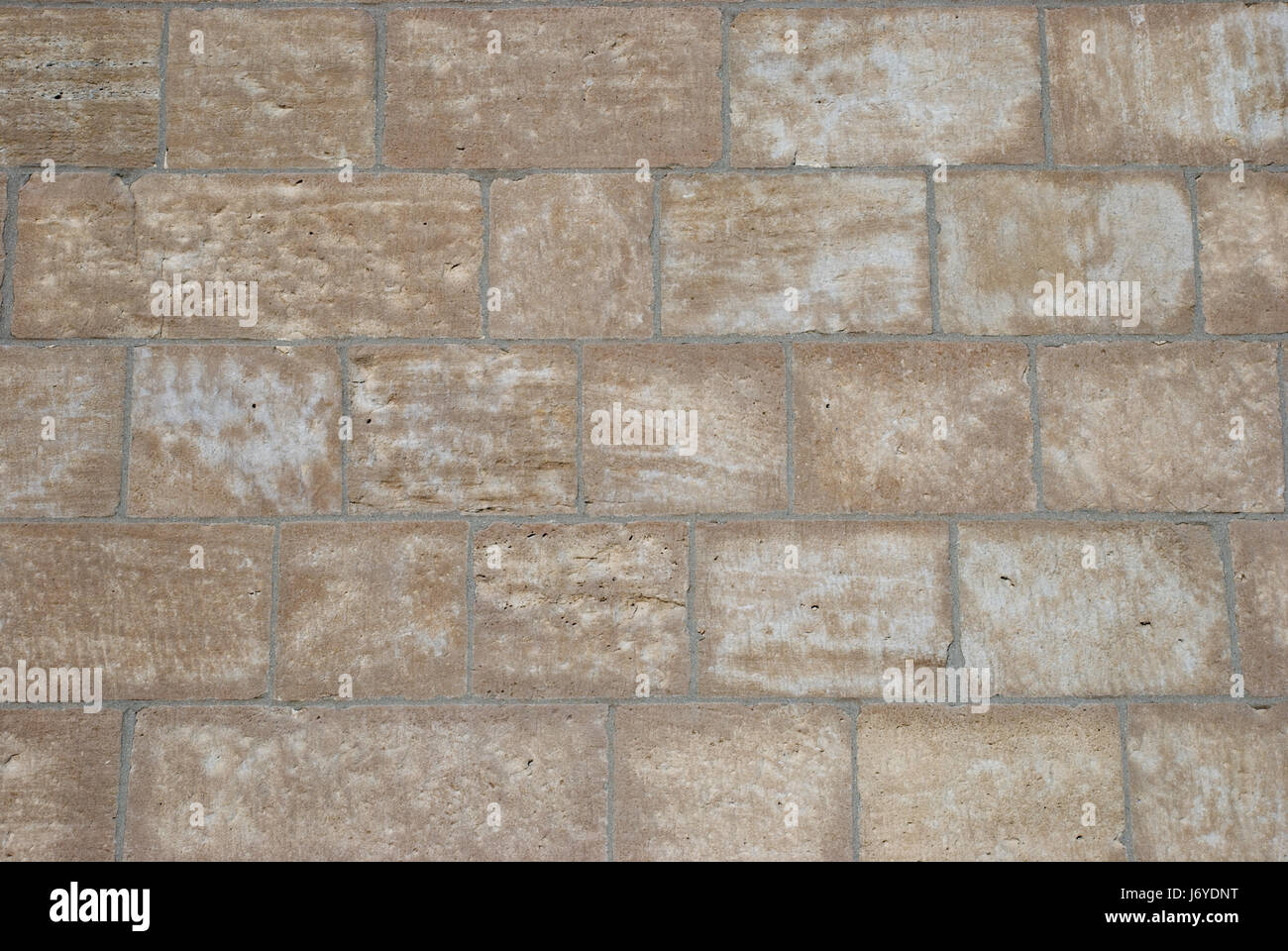 stone wall limestone blocks sandy backdrop background house building ...