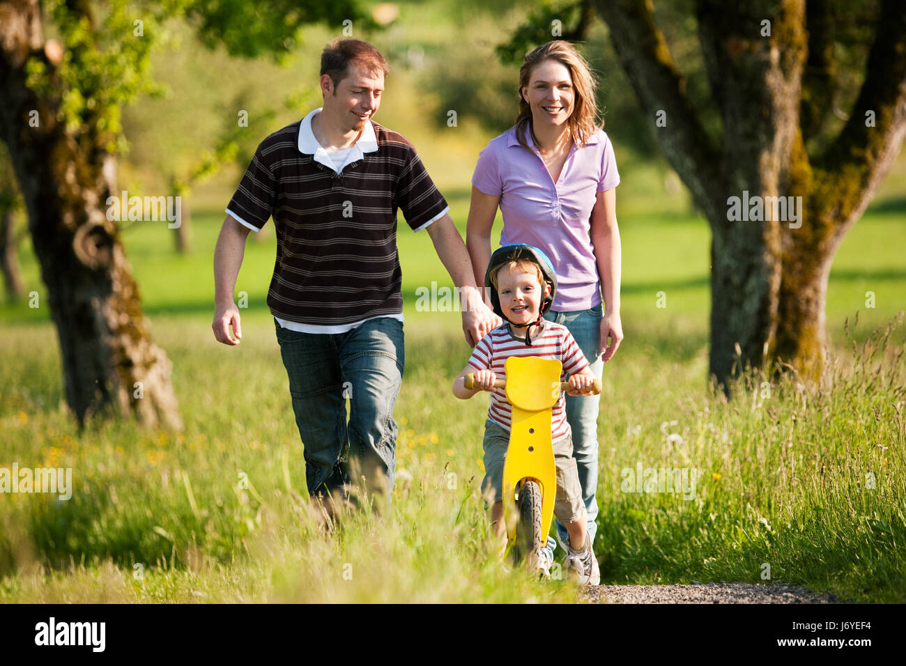 family taking a walk Stock Photo - Alamy