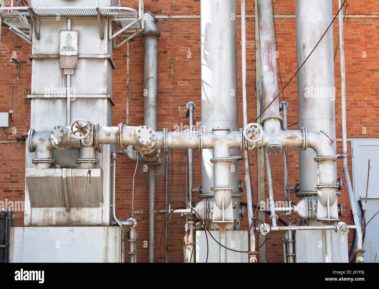 industry industrial engineering gas equipment tubes closeup wheel ...