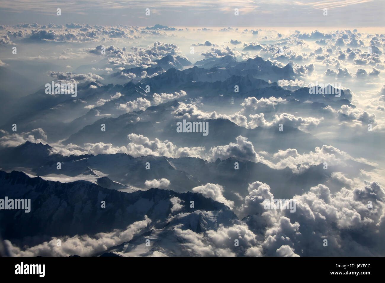 aerial view of clouds over the alps Stock Photo - Alamy