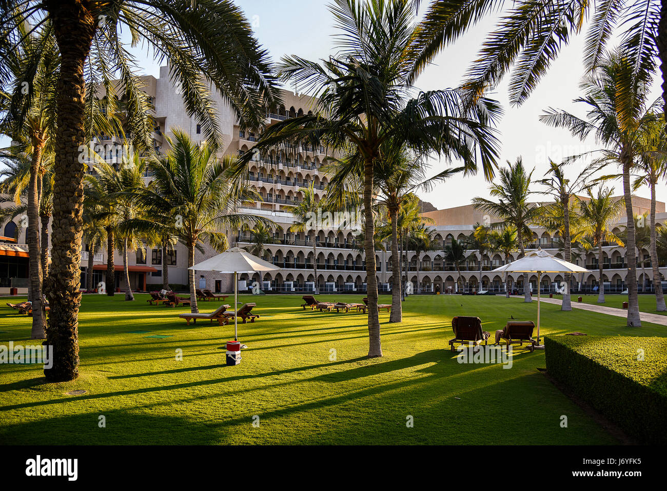Oman Muscat Al-Bustan Palace Hotel beach and gardens Stock Photo - Alamy